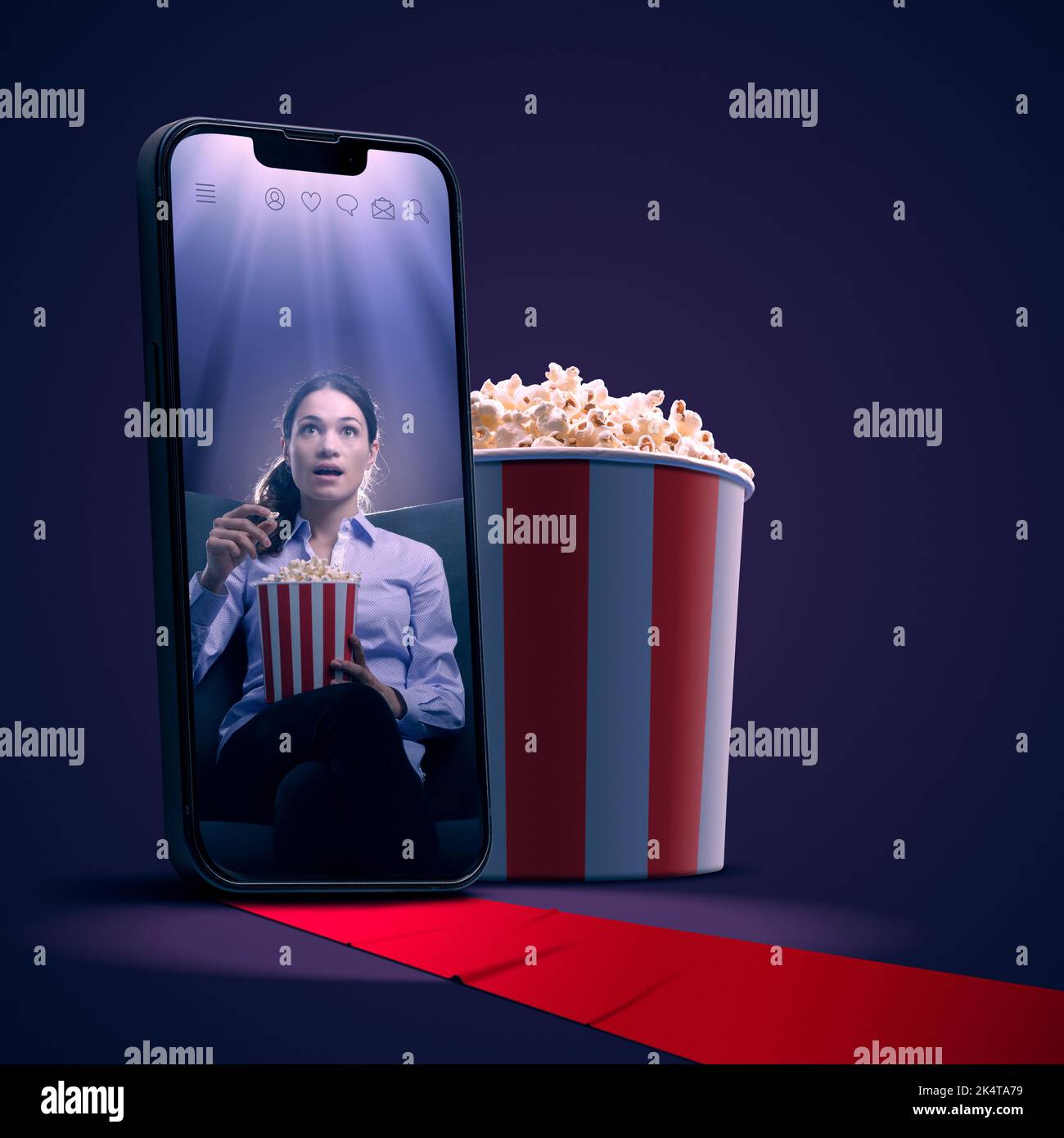 Woman watching movies on a smartphone screen, popcorn and red carpet ...