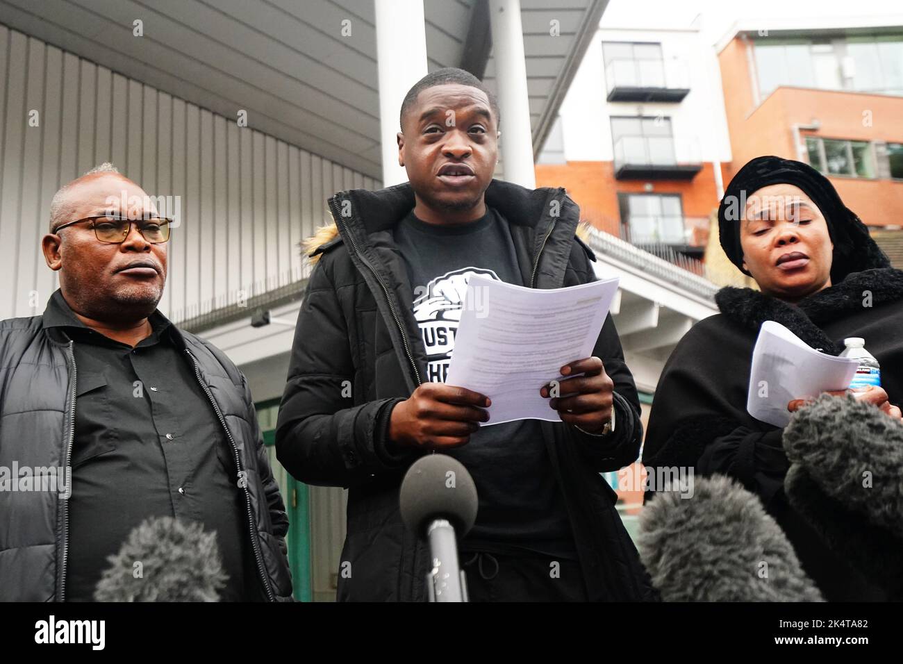 Chris Kaba's cousin Jefferson Bosela reads a statement outside Inner ...