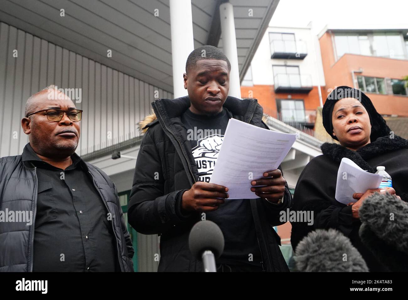 Chris Kaba's cousin Jefferson Bosela reads a statement outside Inner ...