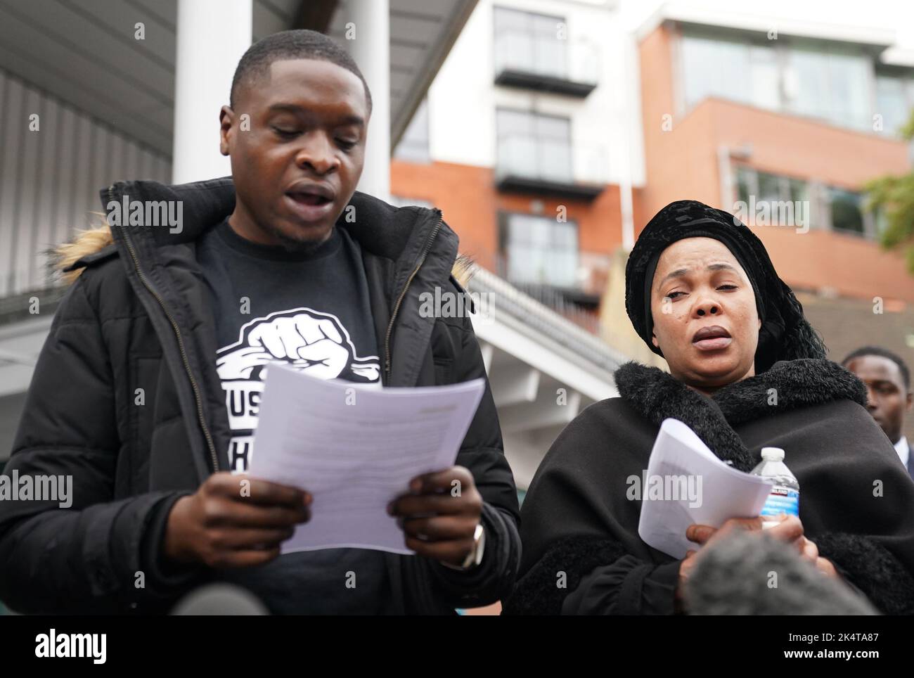 Chris Kaba's cousin Jefferson Bosela reads a statement outside Inner ...
