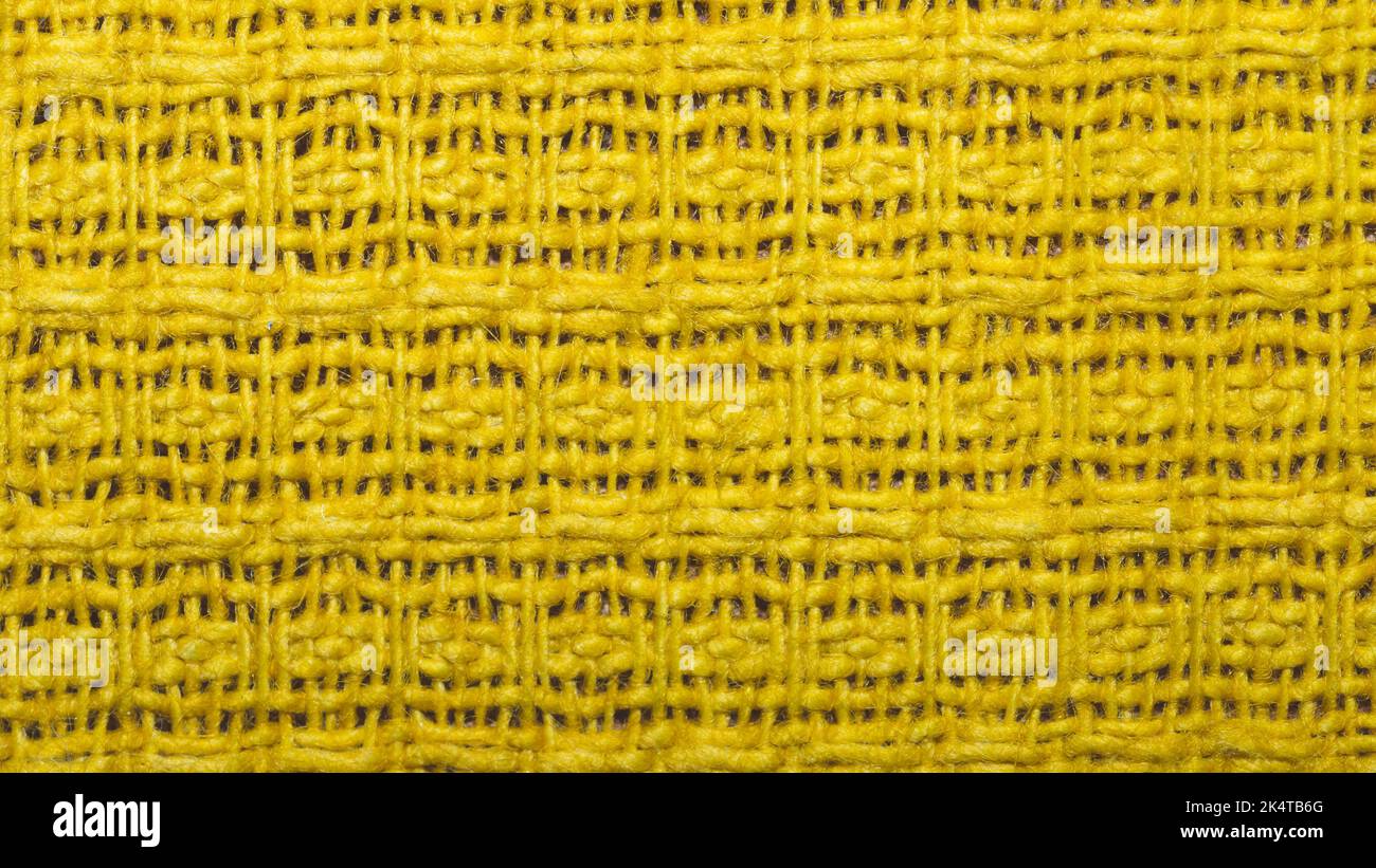 Yellow weave fabric background with waffle pattern close up Stock Photo ...