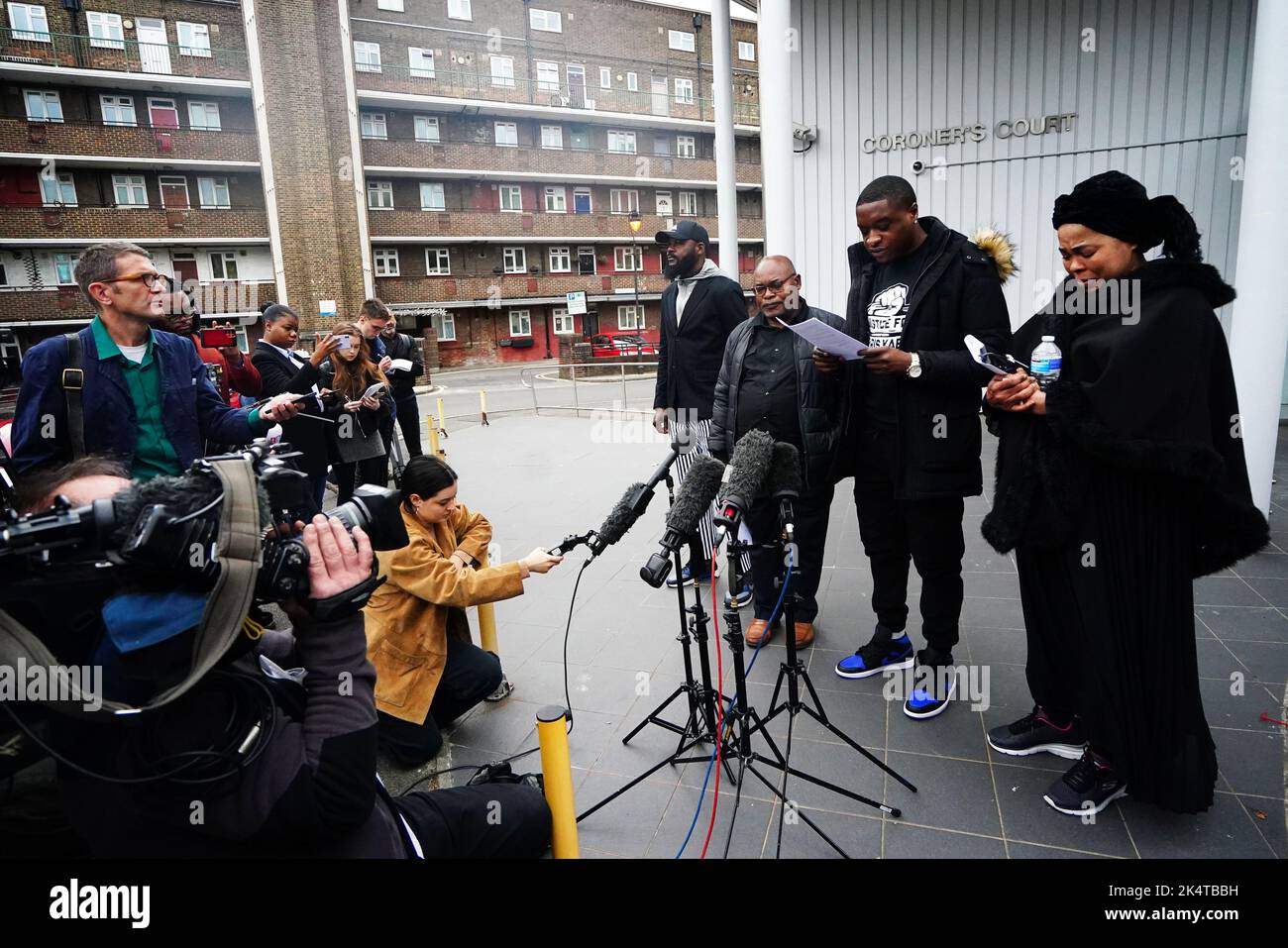 Chris Kaba's cousin Jefferson Bosela reads a statement outside Inner ...