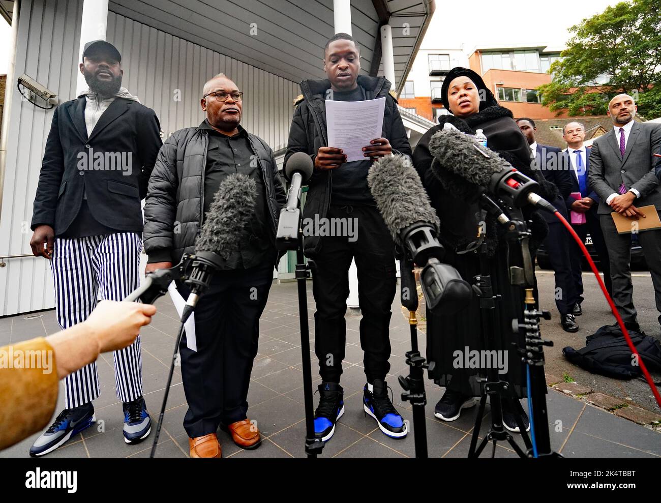 Chris Kaba's cousin Jefferson Bosela reads a statement outside Inner ...