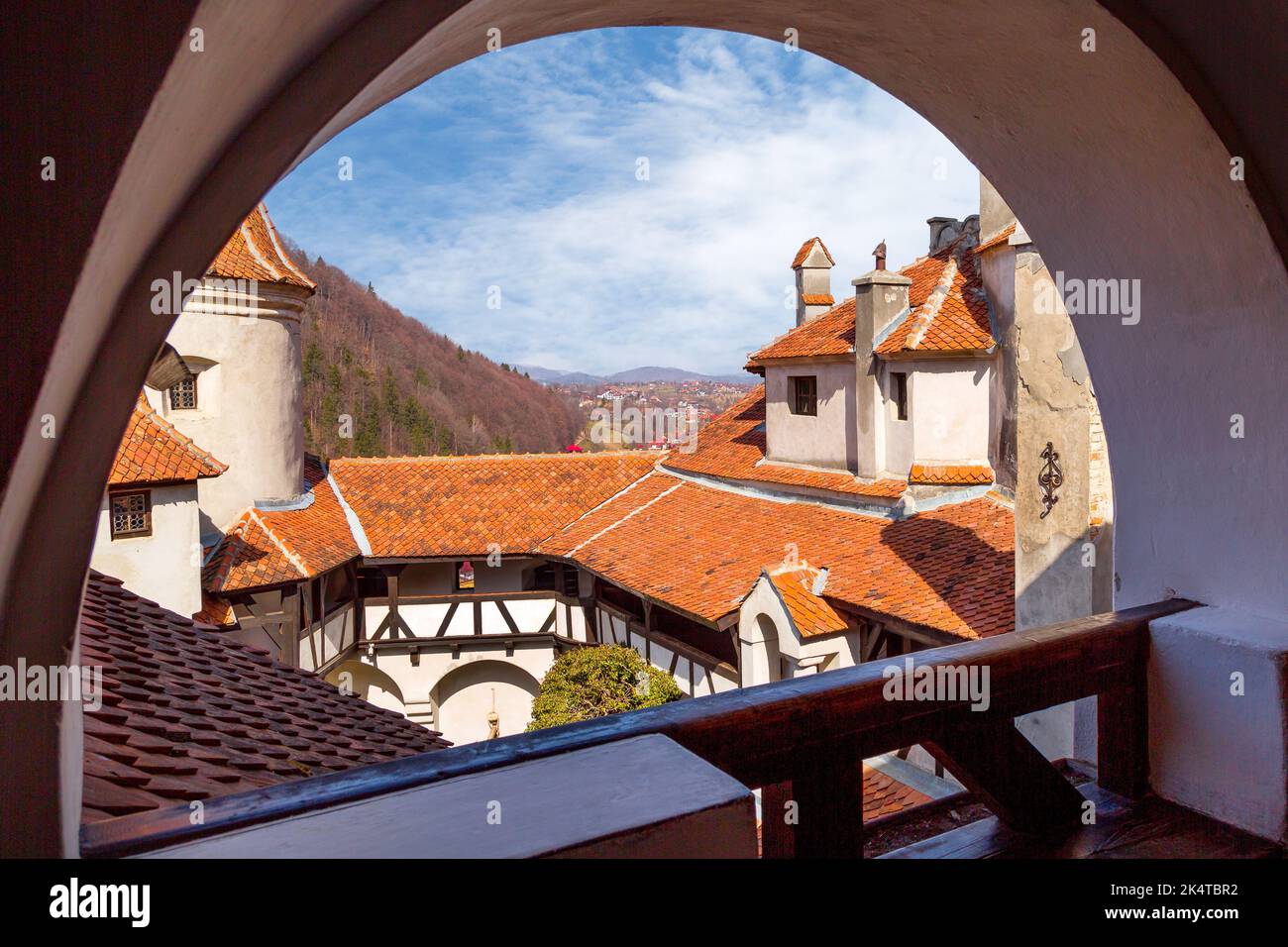 Courtyard tower view of Dracula castle through the arch in Bran ...