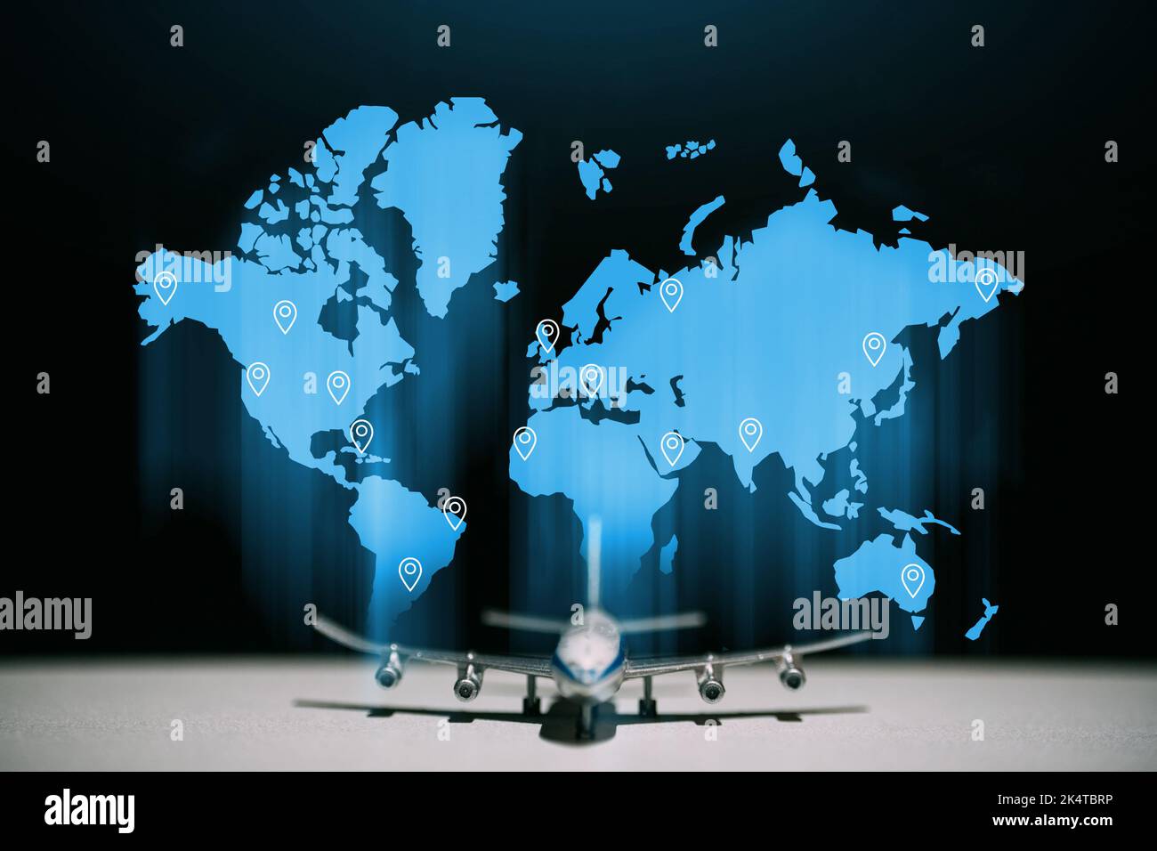 Plane model with holographic world map with waypoints Stock Photo - Alamy