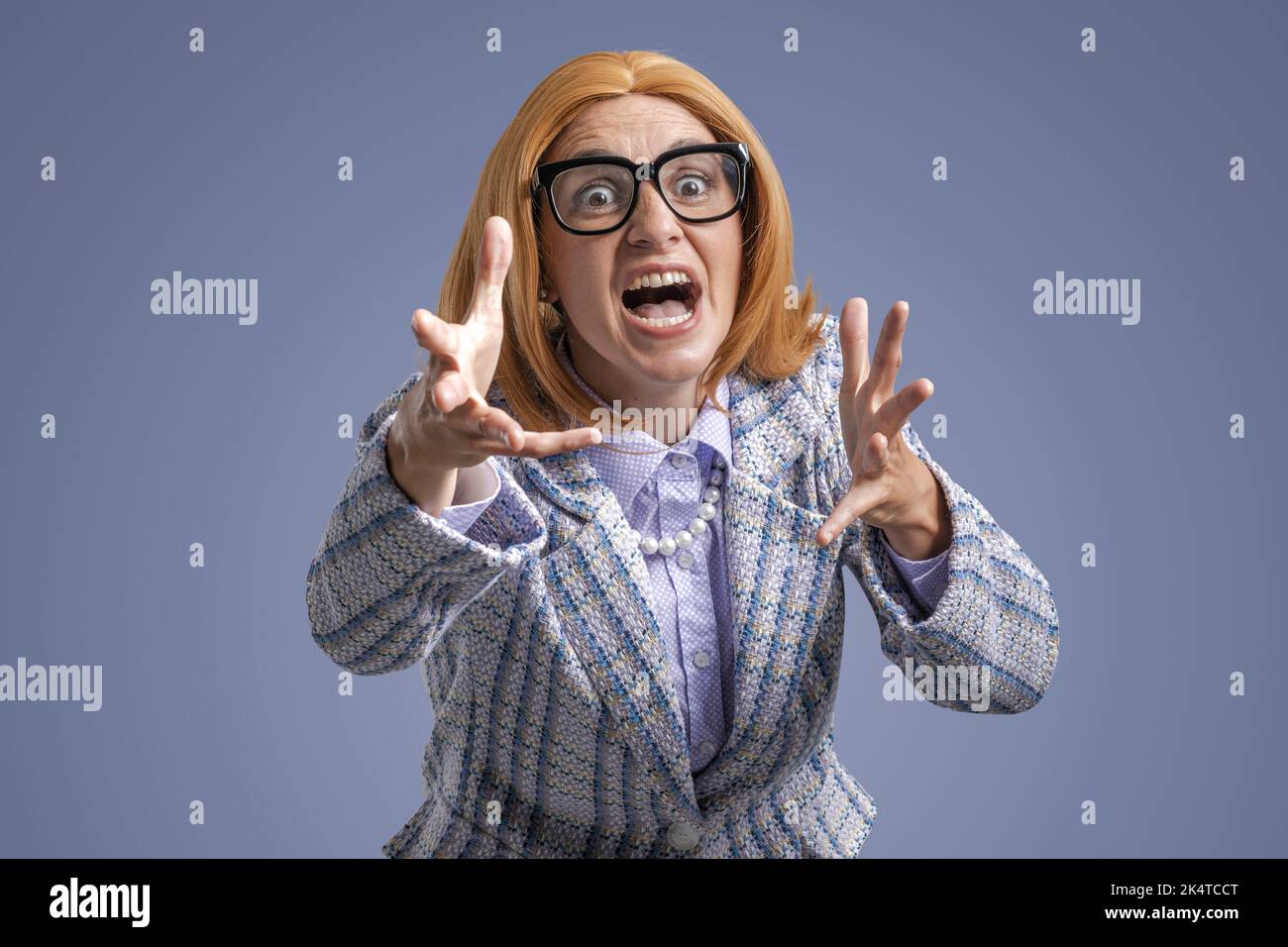 Aggressive Woman Shouting At Camera And Gesturing Angry Boss Concept