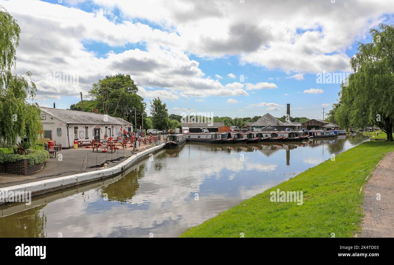 Narrowboats or barges at the wharf at Norbury Junction on the ...