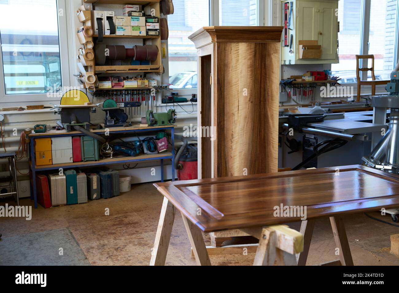 Freshly Oiled Walnut Cabinet Door Drying On Wooden Trestles In Front Of ...