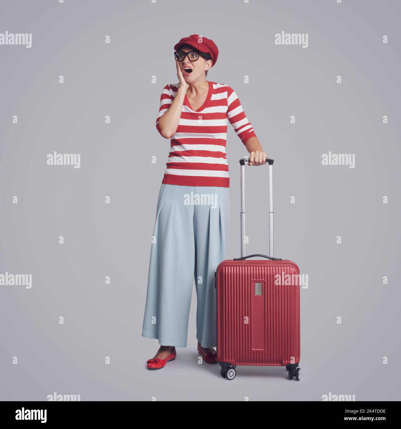 Panicked traveler woman with luggage, she is lost and confused, travel ...