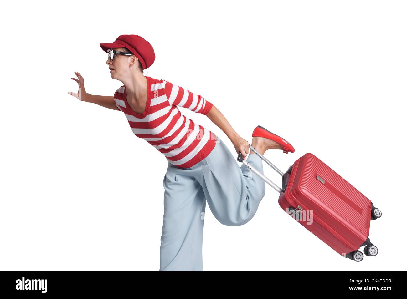 Traveler woman running fast with her suitcase, she is late for her ...