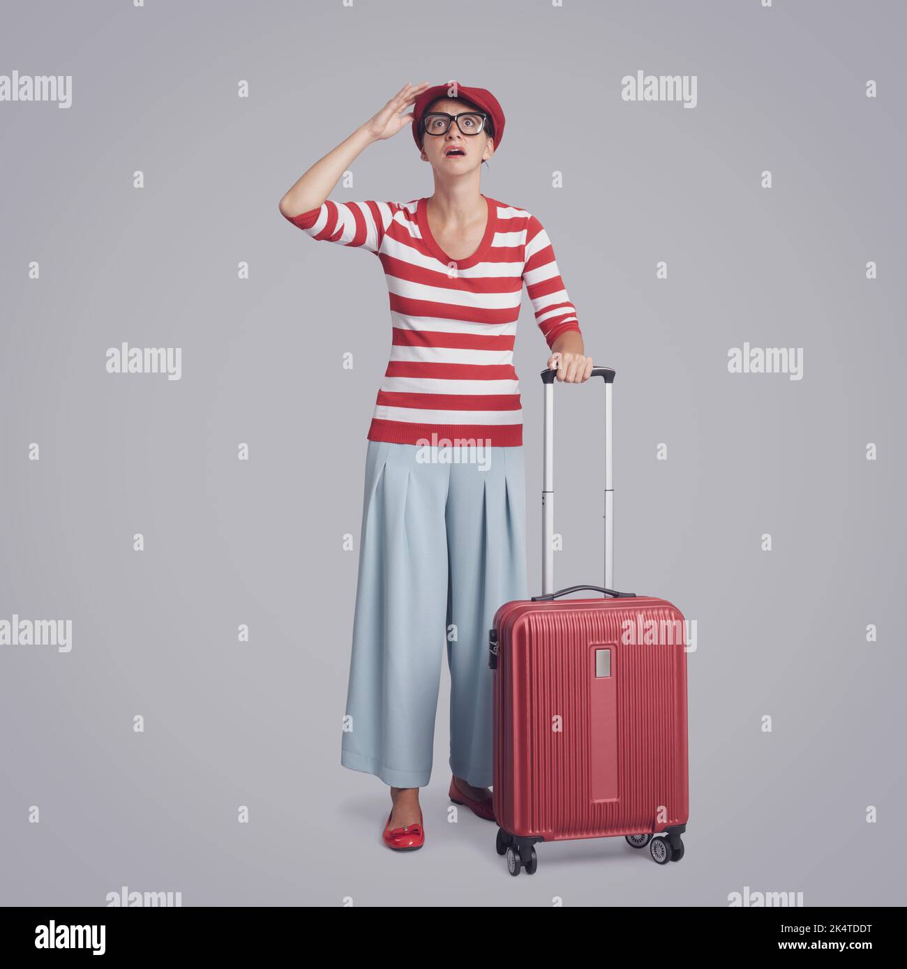 Panicked traveler woman with luggage, she is lost and confused, travel ...