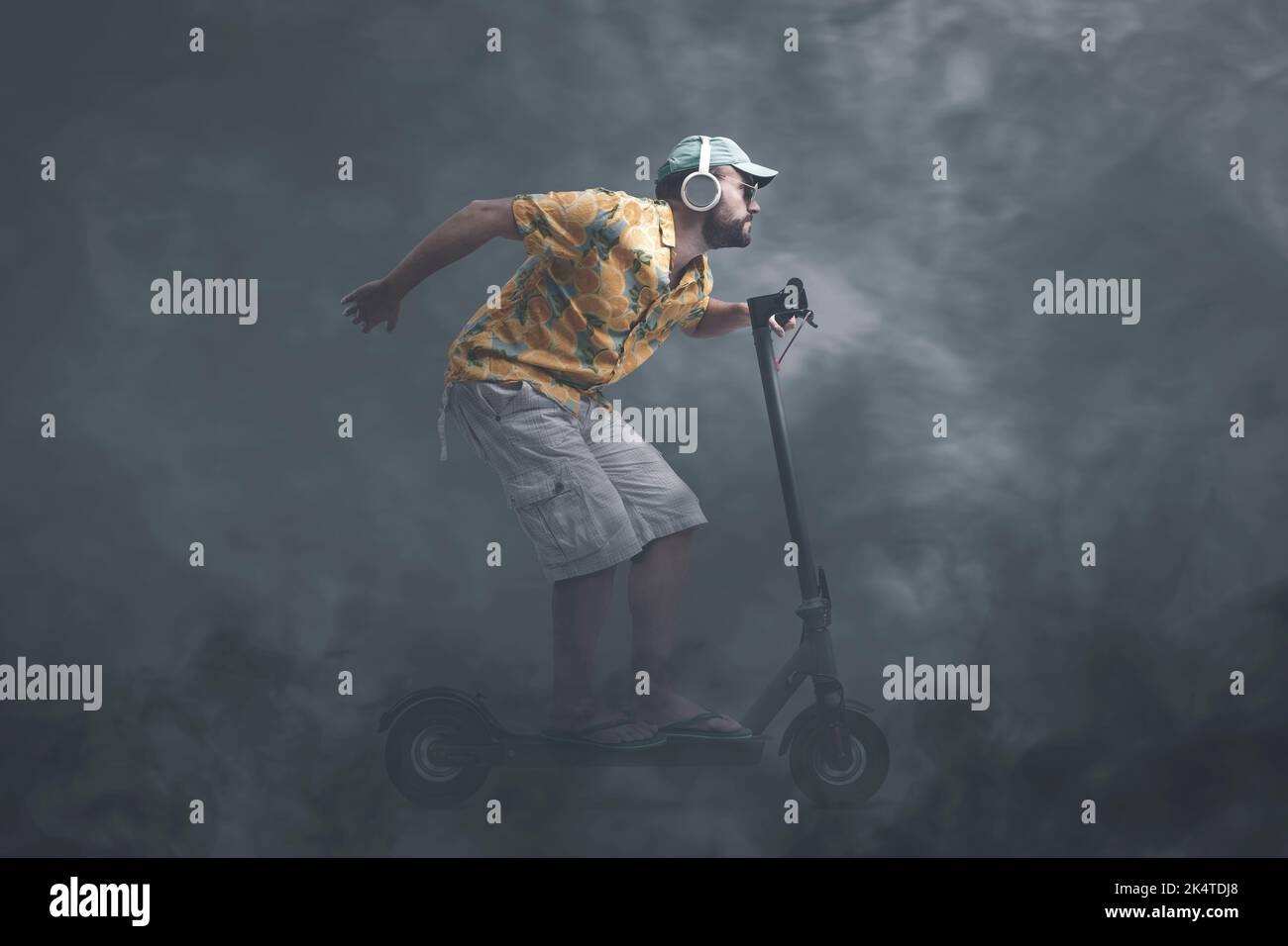 Cool man riding an electrical scooter surrounded by pollution and smog ...