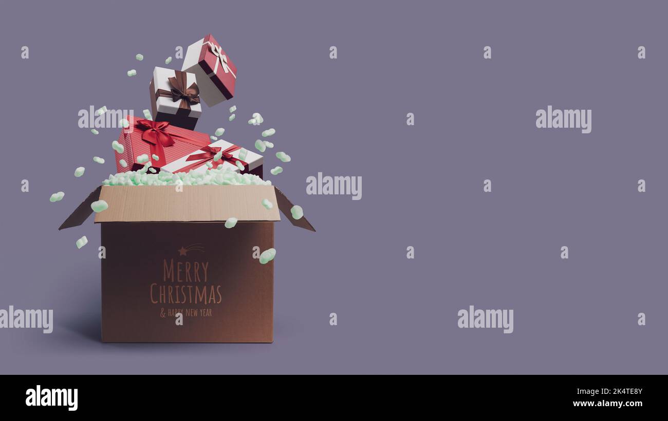 Beautiful Christmas gifts coming out from a delivery box and Christmas ...