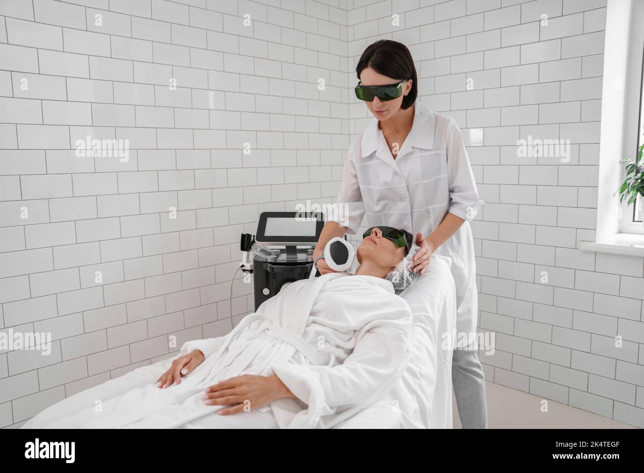 Professional cosmetologist is making cavitation rejuvenation skin ...