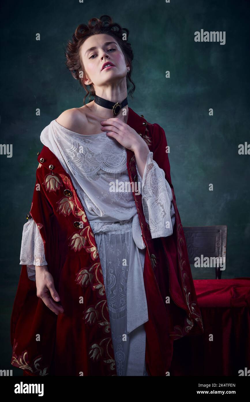 Portrait of young fantastic woman with pale skin in medieval dress ...