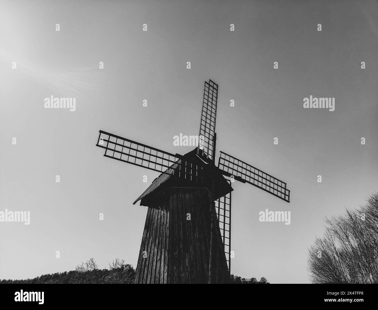 Old wooden windmill. rural building. black and white Stock Photo - Alamy