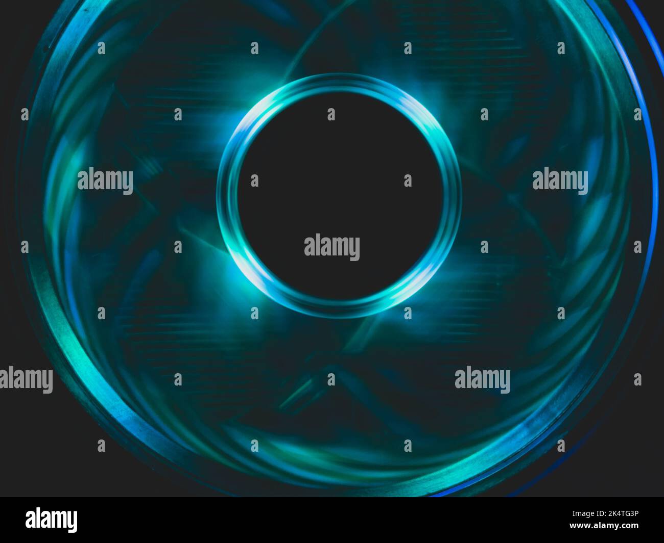 Computer fan with blue light abstract background. cooler in action with ...