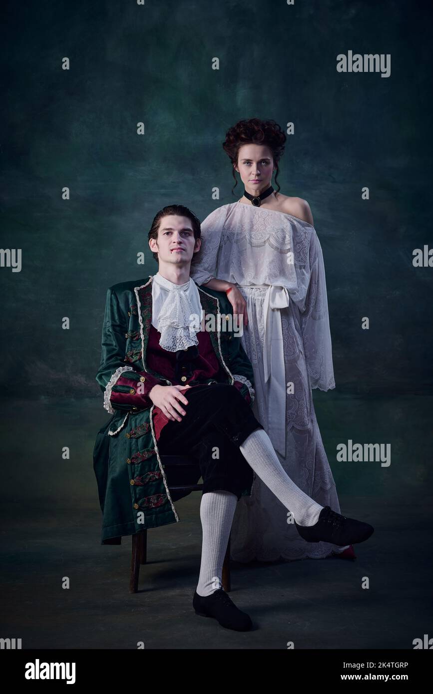 Portrait of legend medieval family, man and woman in image of vampires ...