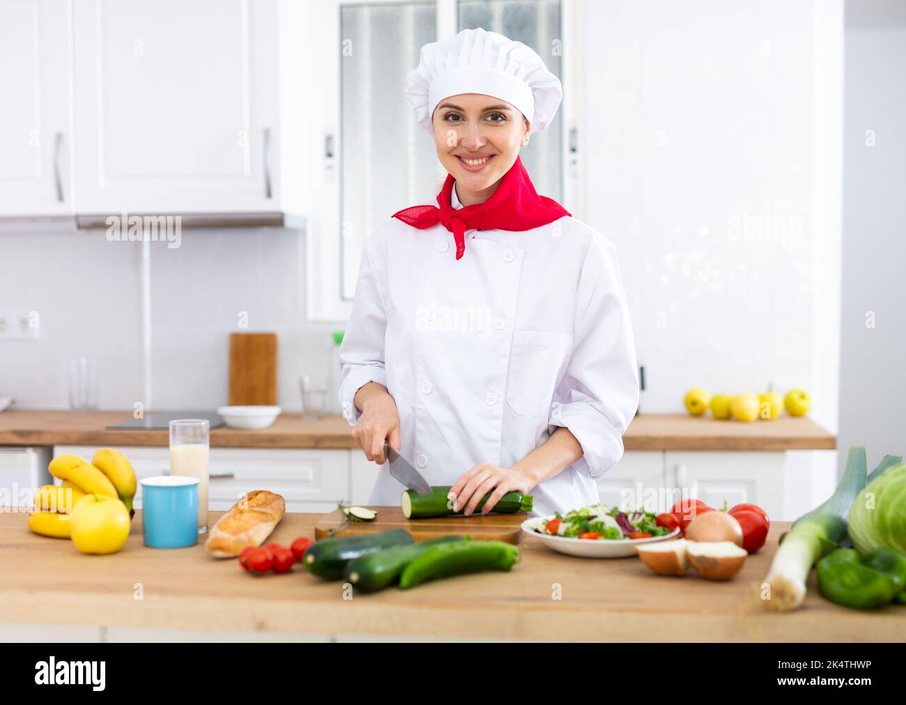 Cook in uniform hi-res stock photography and images - Alamy