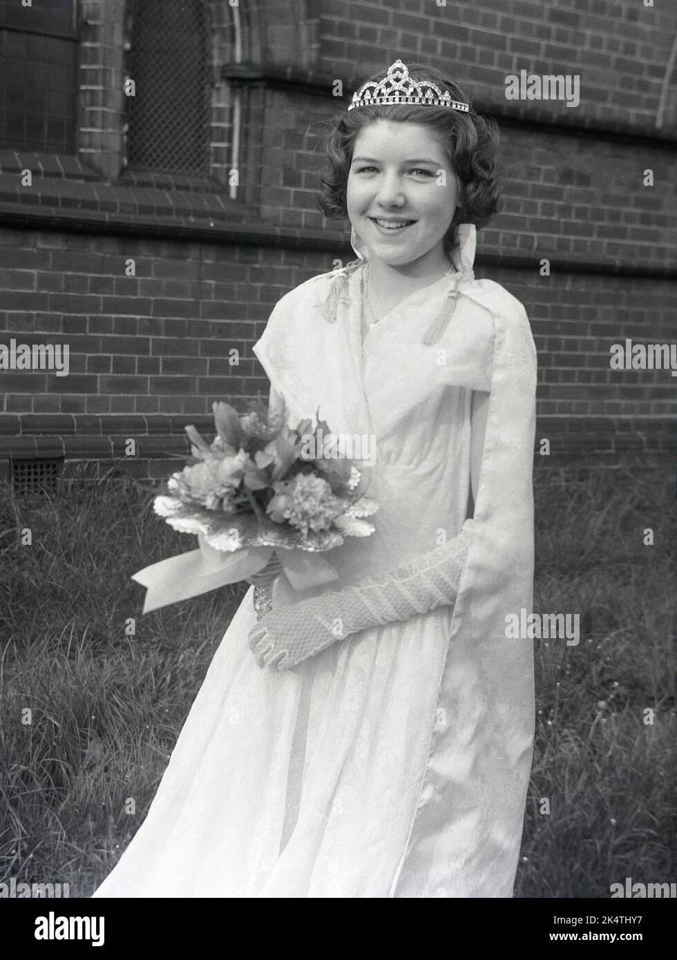 1961, historical, the May Queen, a teenager girl in her costume and ...