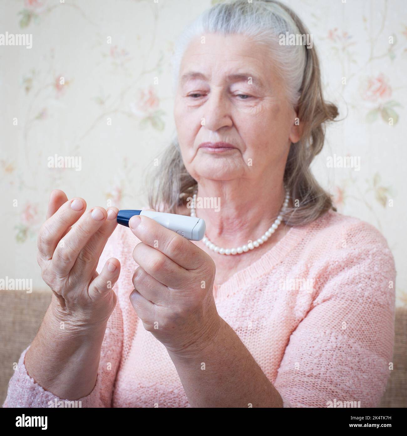 Nurse female patient glucometer hi-res stock photography and images - Alamy