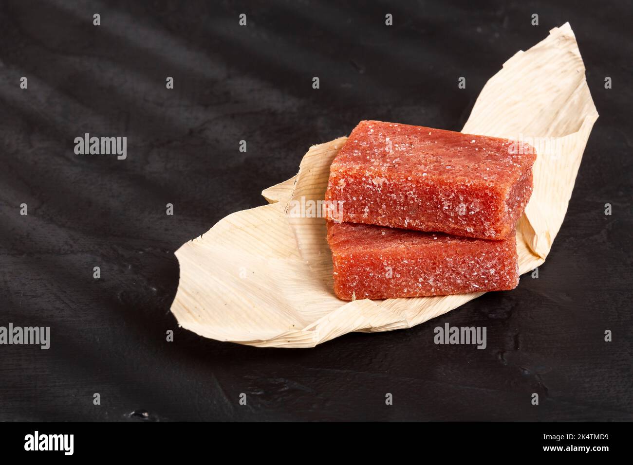 Guava Paste Wrapped in Bijao Leaf; Photo On Black Background Stock ...