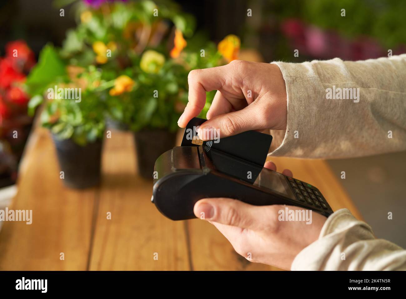 Cashless payment with a credit card using the reader at the checkout as ...