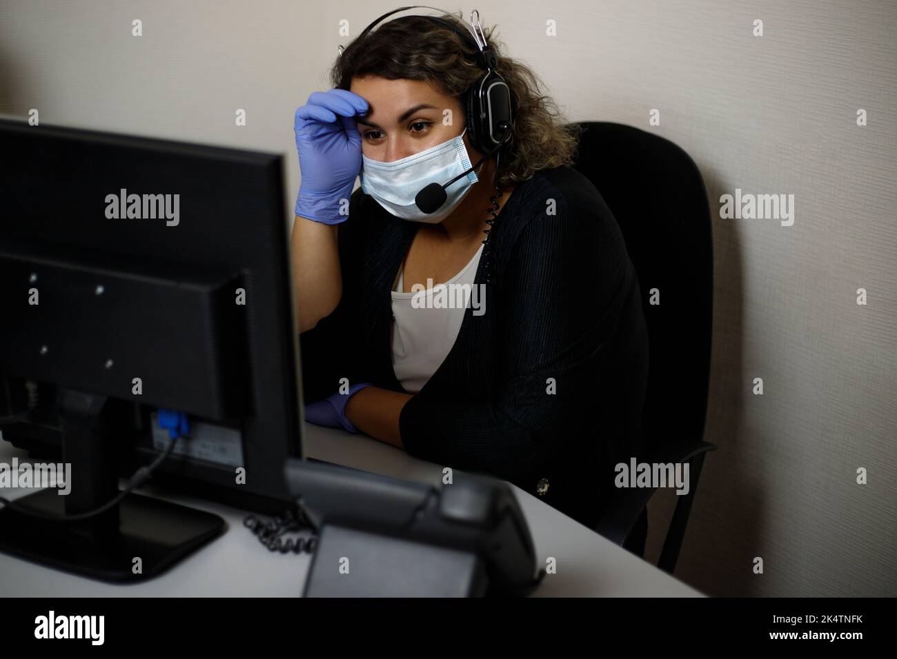 Female security operator in headset hi-res stock photography and images ...