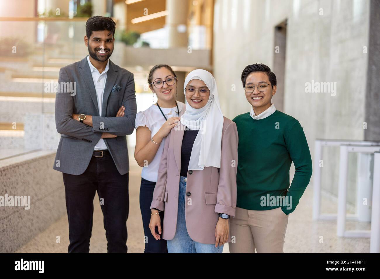 Multi-ethnic business group in an office building Stock Photo - Alamy