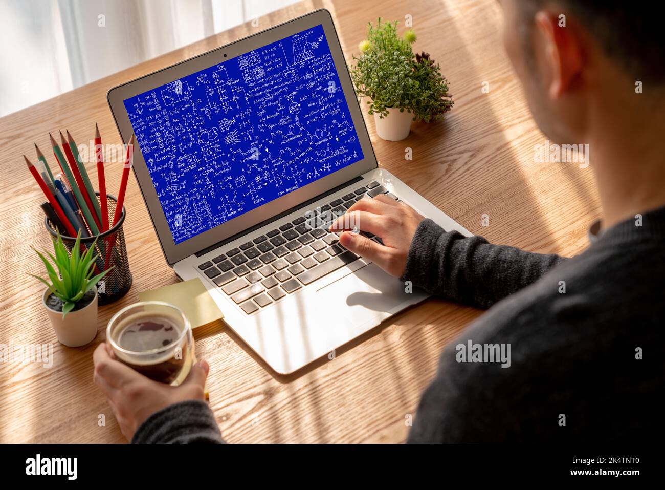 Mathematic equations and modish formula on computer screen showing ...