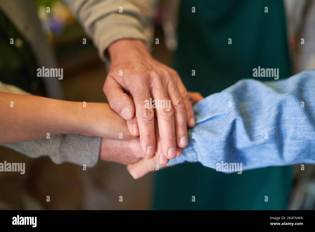 Group of people stacking hands as concept for motivation and team ...
