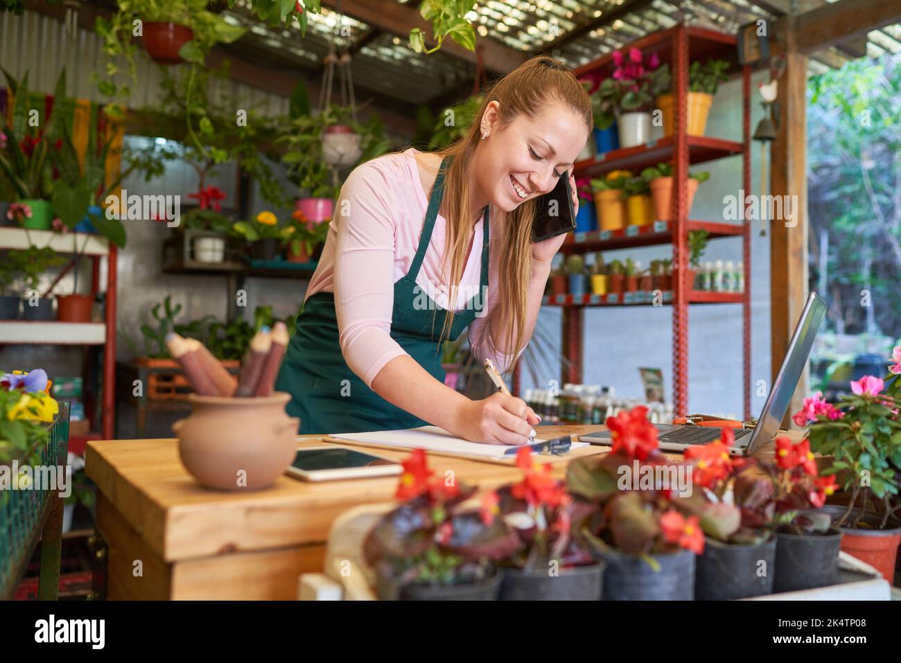 Young florist taking notes on hi-res stock photography and images - Alamy