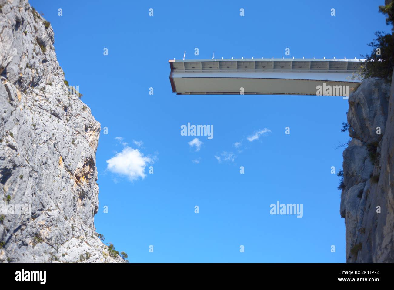 Unfinished bridge over the abyss . Observation deck in the mountains ...