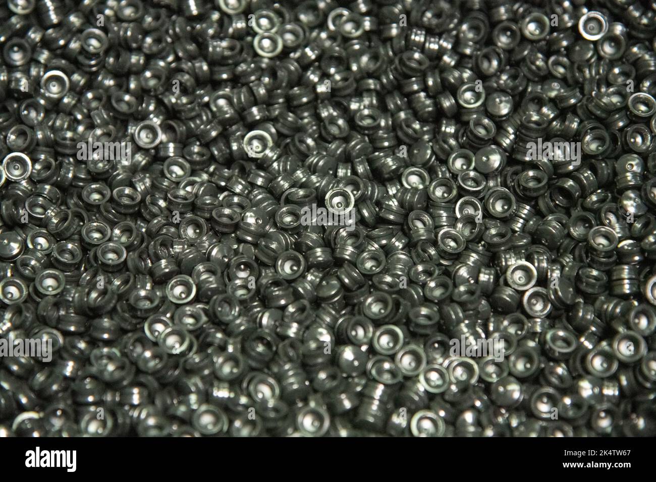 A top view of a stack of internal parts for the production of medical ...