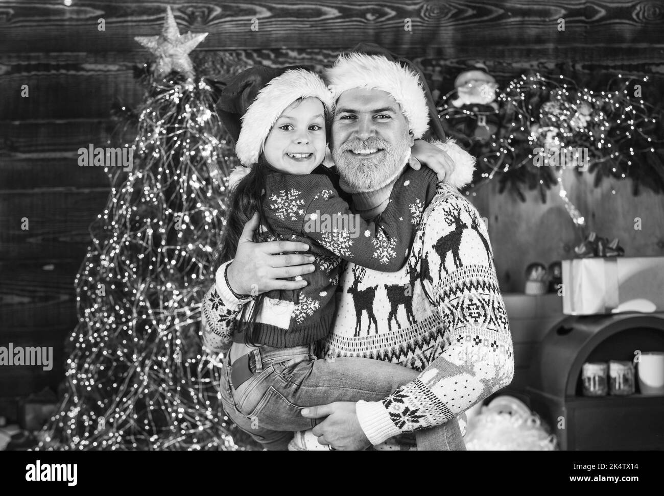 Dad daughter christmas shopping Black and White Stock Photos & Images ...