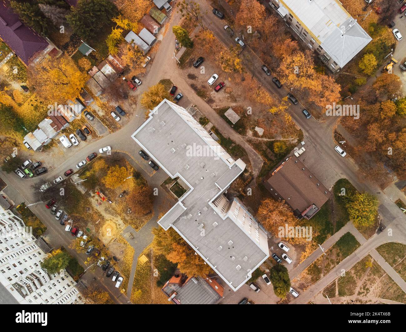 Aerial rooftop view on residential buildings in orange vibrant district ...