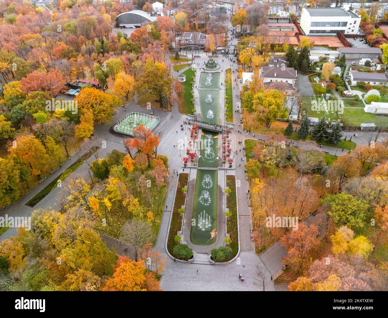 Aerial view on vibrant autumn Shevchenko City Garden with fountains ...