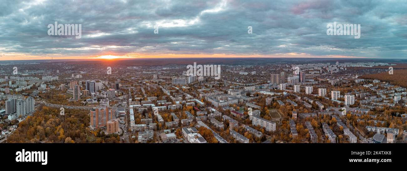 Aerial autumn city sunset wide panorama view with sun shine in epic ...