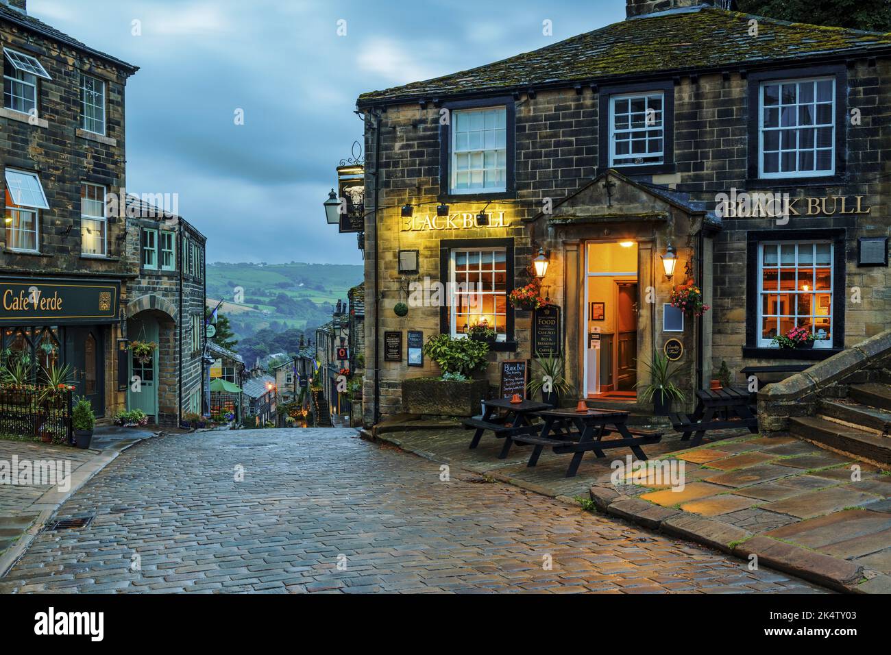 Haworth Main Street (steep hill, old buildings, blue hour evening light ...