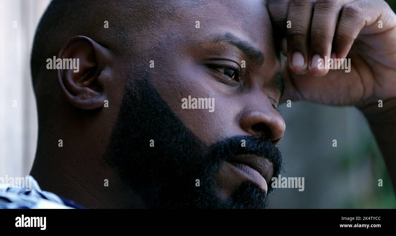 Worried black man close-up face. Anxious African guy Stock Photo - Alamy