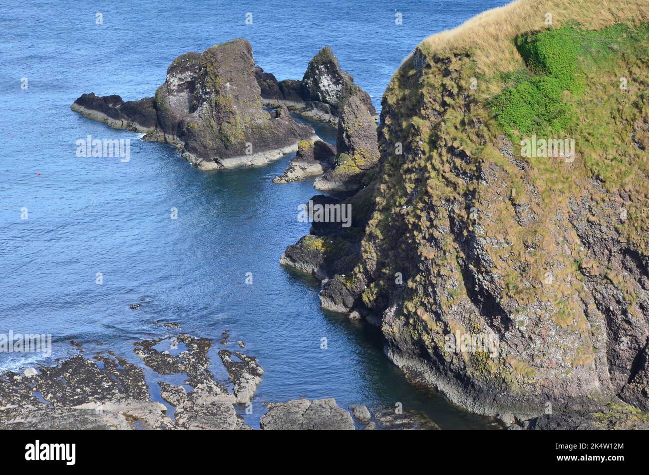 Sea cliffs along the coastal path for Dunottar Castle, Stonehaven ...