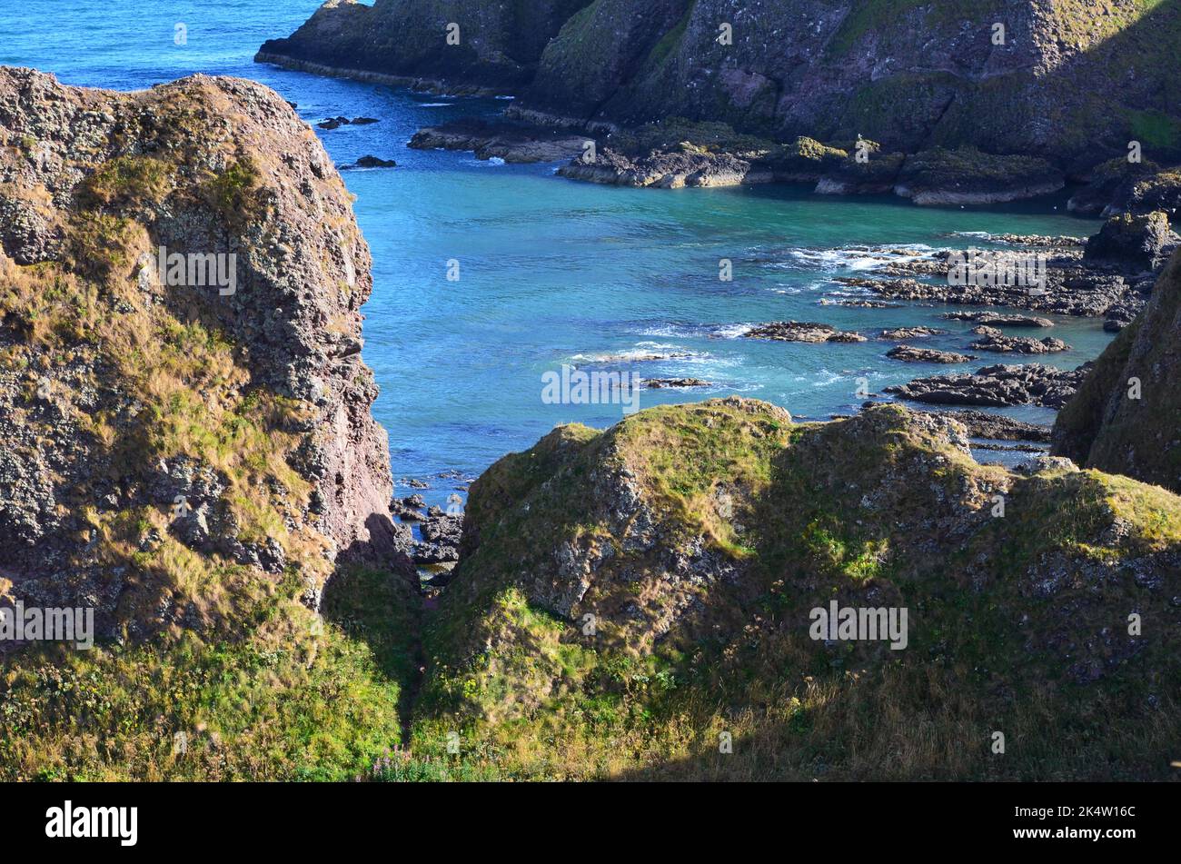 Sea cliffs along the coastal path for Dunottar Castle, Stonehaven ...