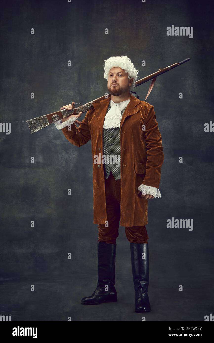 Nobleman, medieval royal person in vintage hunting clothing with old ...