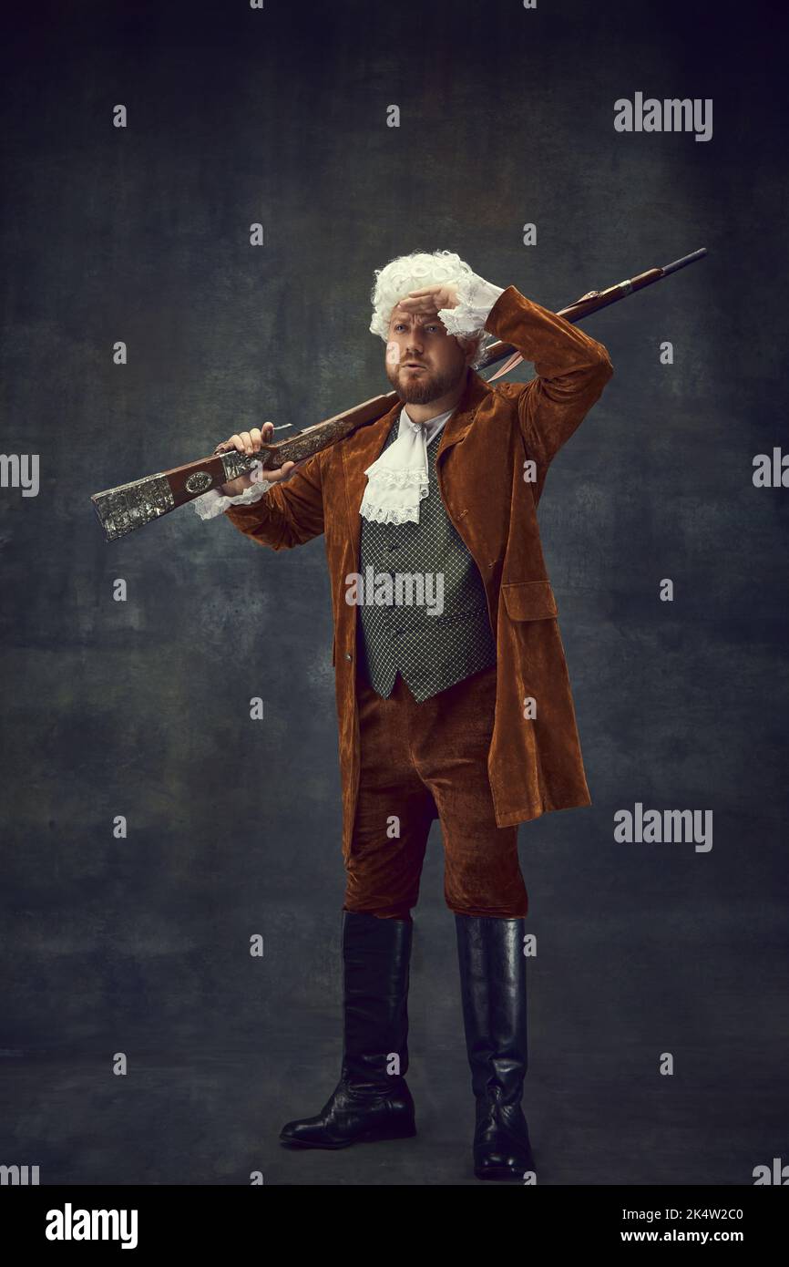 Nobleman, medieval royal person in vintage hunting clothing with old ...