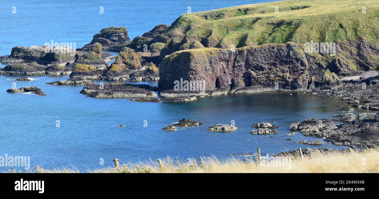 Sea cliffs along the coastal path for Dunottar Castle, Stonehaven ...