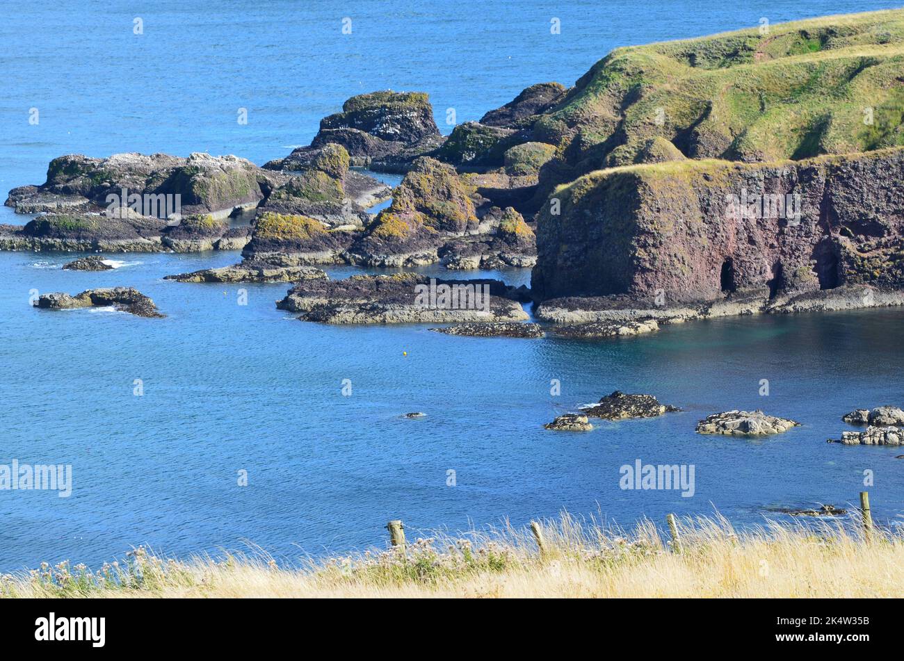 Sea cliffs along the coastal path for Dunottar Castle, Stonehaven ...