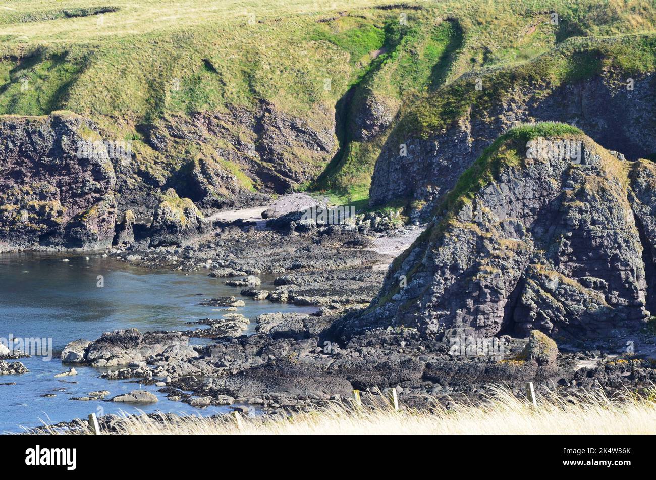 Sea cliffs along the coastal path for Dunottar Castle, Stonehaven ...