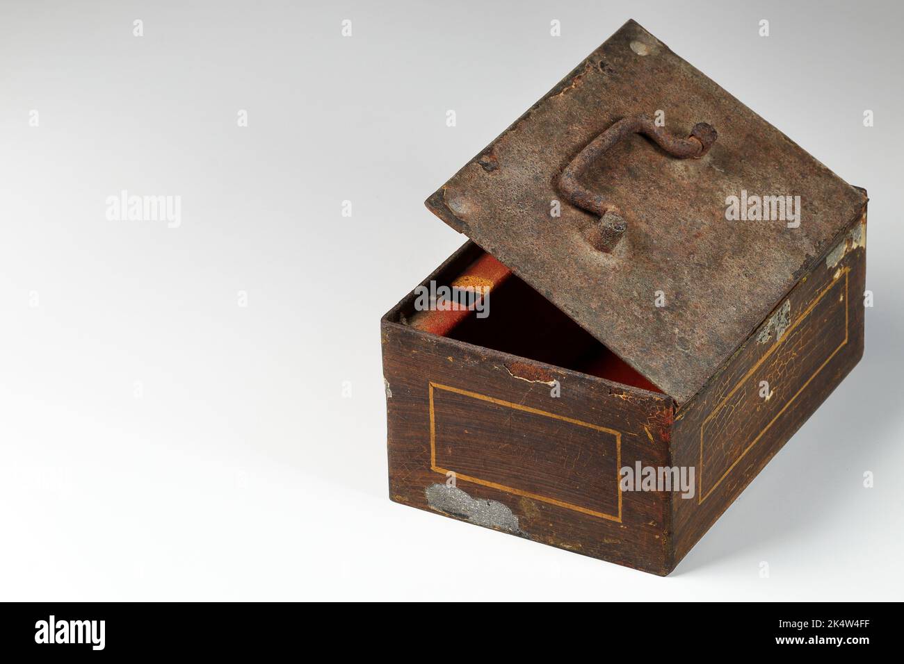 Open Vintage small metal money box or steel chest isolated on white ...