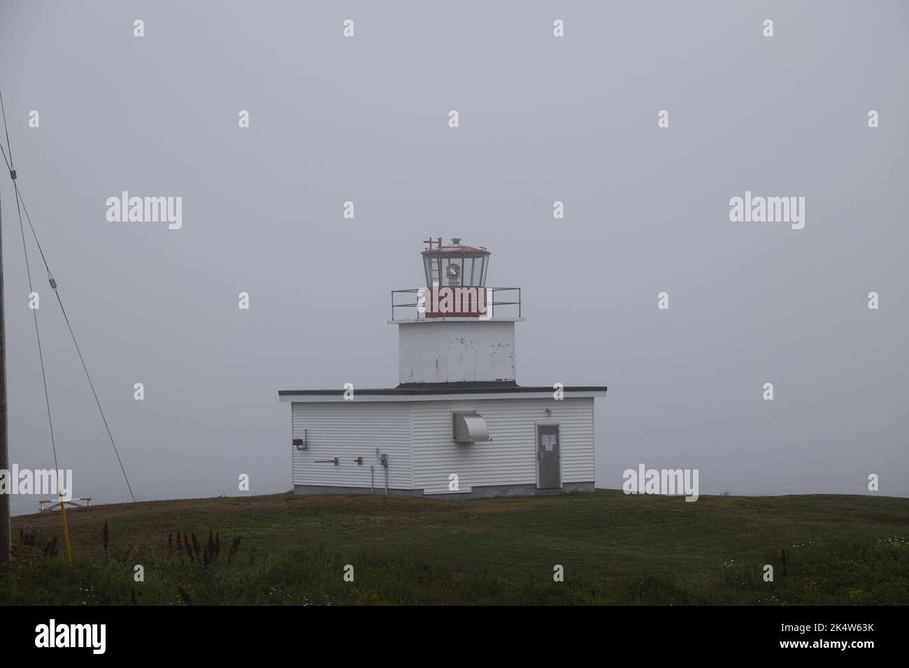 Grand Passage Lighthouse in the fog, Nova Scotia Stock Photo - Alamy