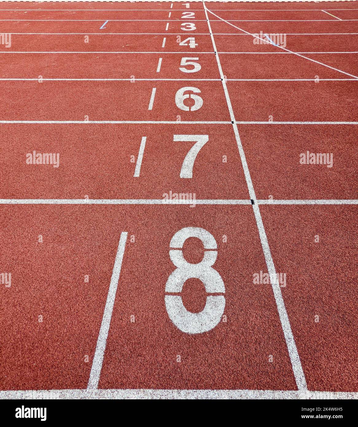 A vertical top view of the red numbered track lane Stock Photo - Alamy
